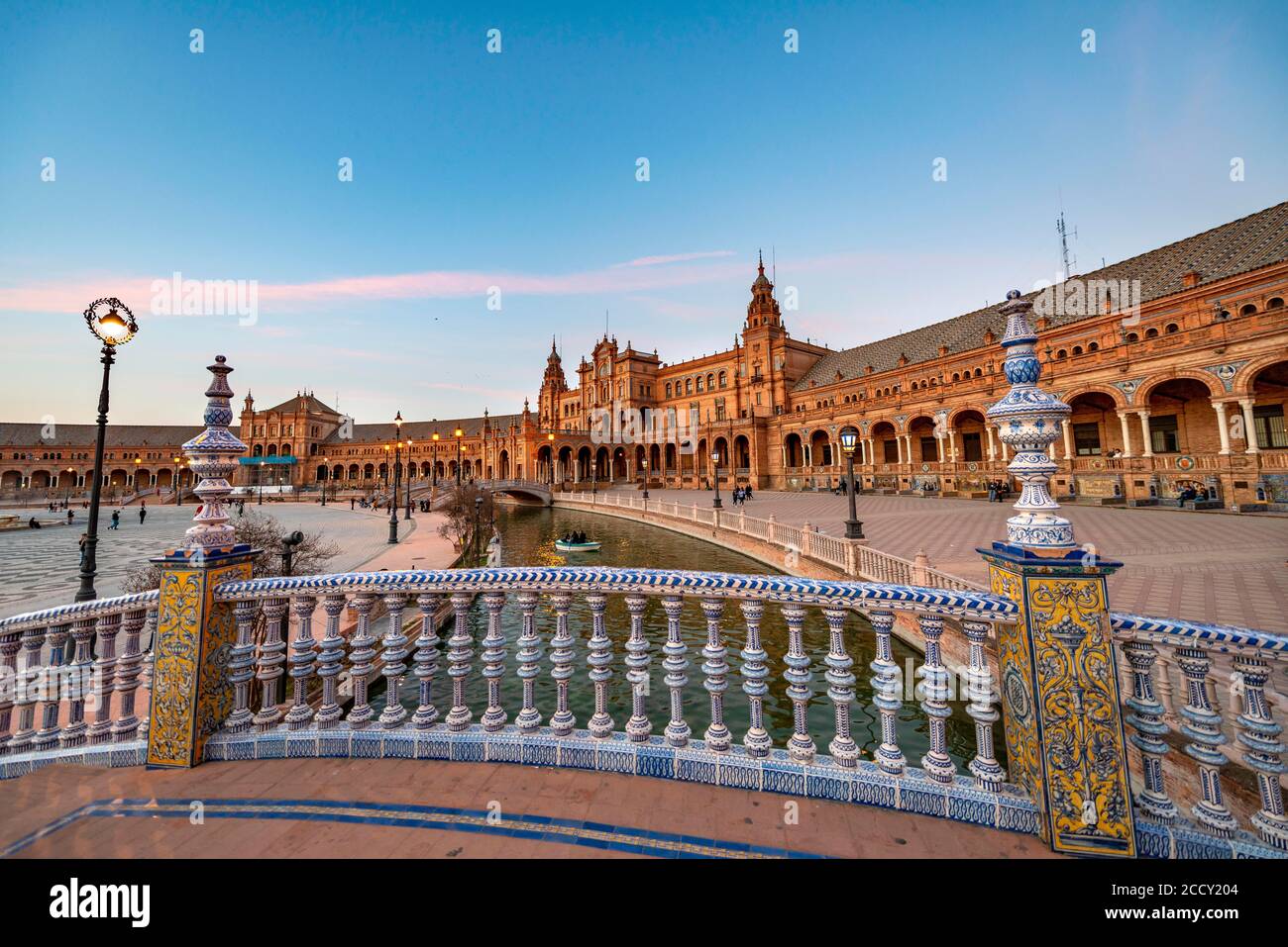 Bridge over canal, railing with painted azulejo tiles, Plaza de Espana ...