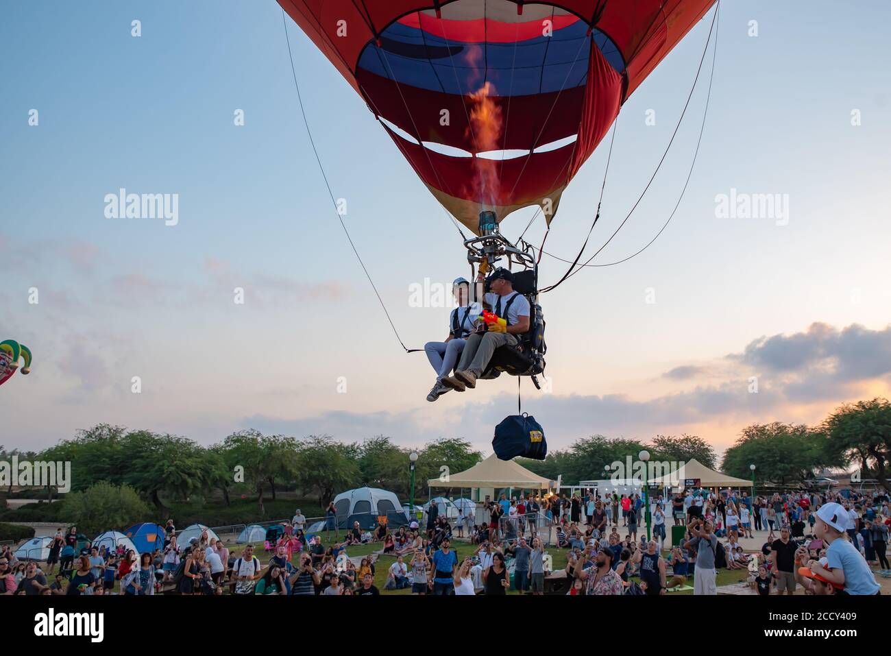 Man flying balloons hi-res stock photography and images - Alamy