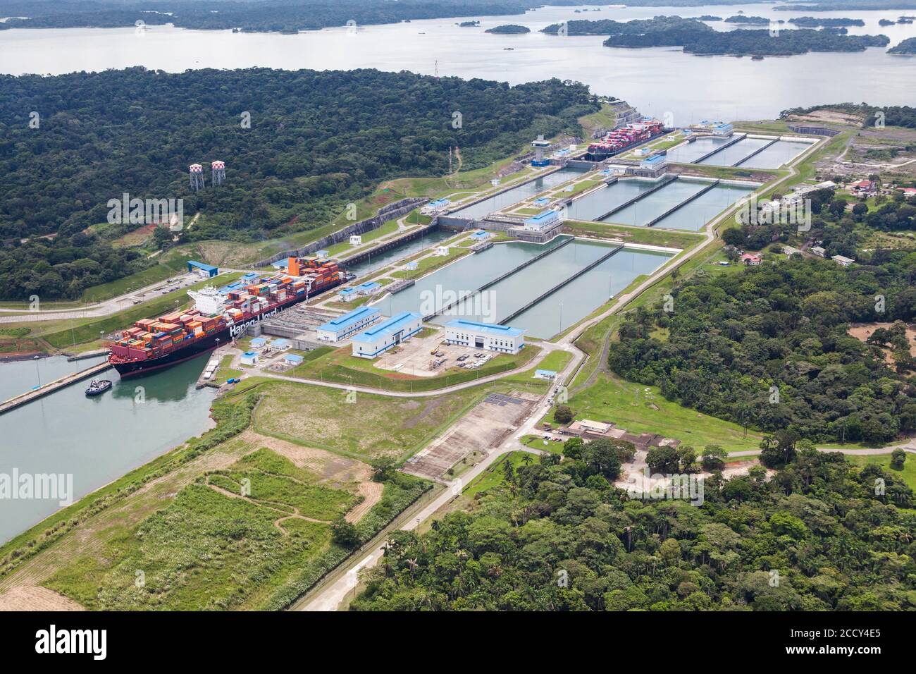 Aerial view of two Neo-Panamax container ships crossing the third set ...