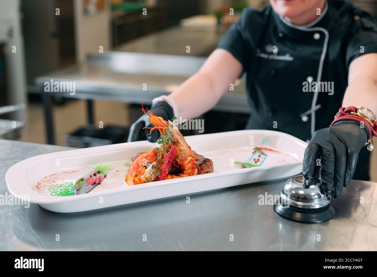 Cook with a ready-made dish with Shrimp Stock Photo - Alamy