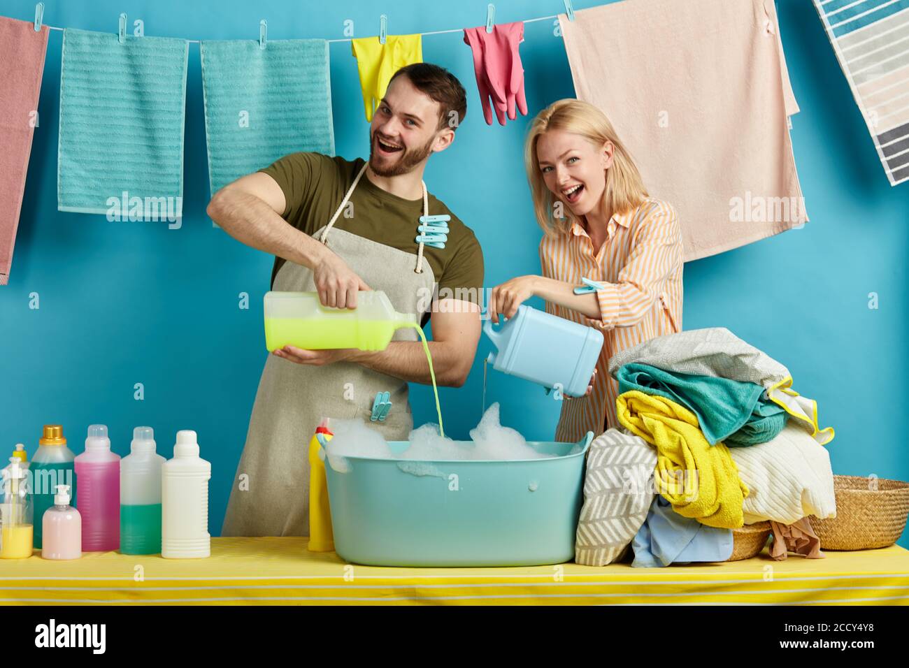 Hand washing clothes in bowl hi-res stock photography and images - Alamy