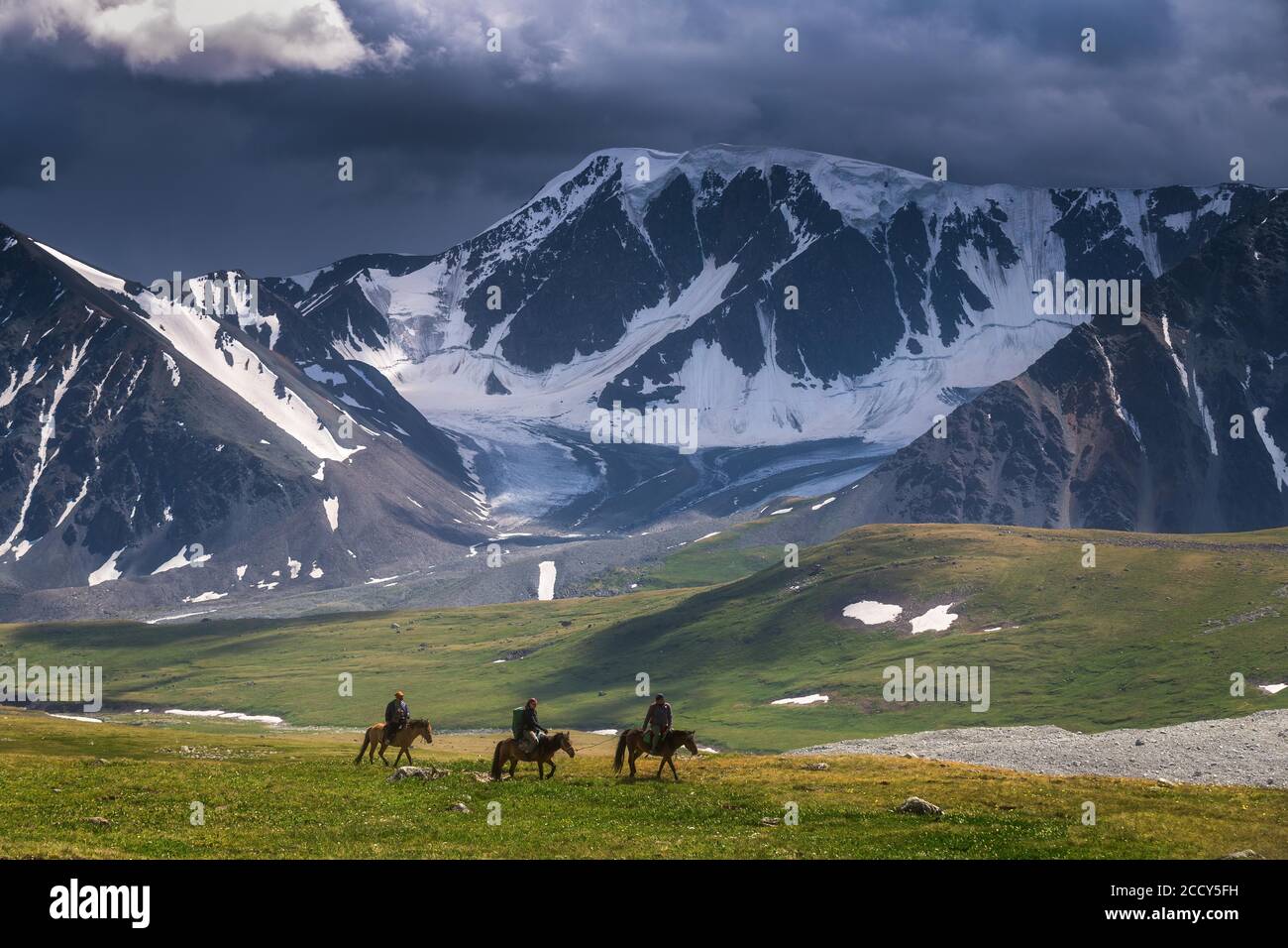 Horse riding tour in Mongolian Altai mountains. Altai 5 bogd mountain ...