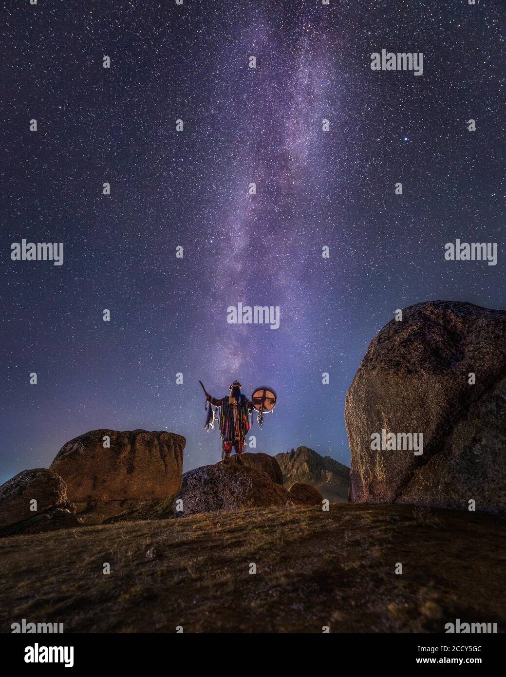 Mongolian shaman under sky full of stars. Terelj national park, Tuv ...