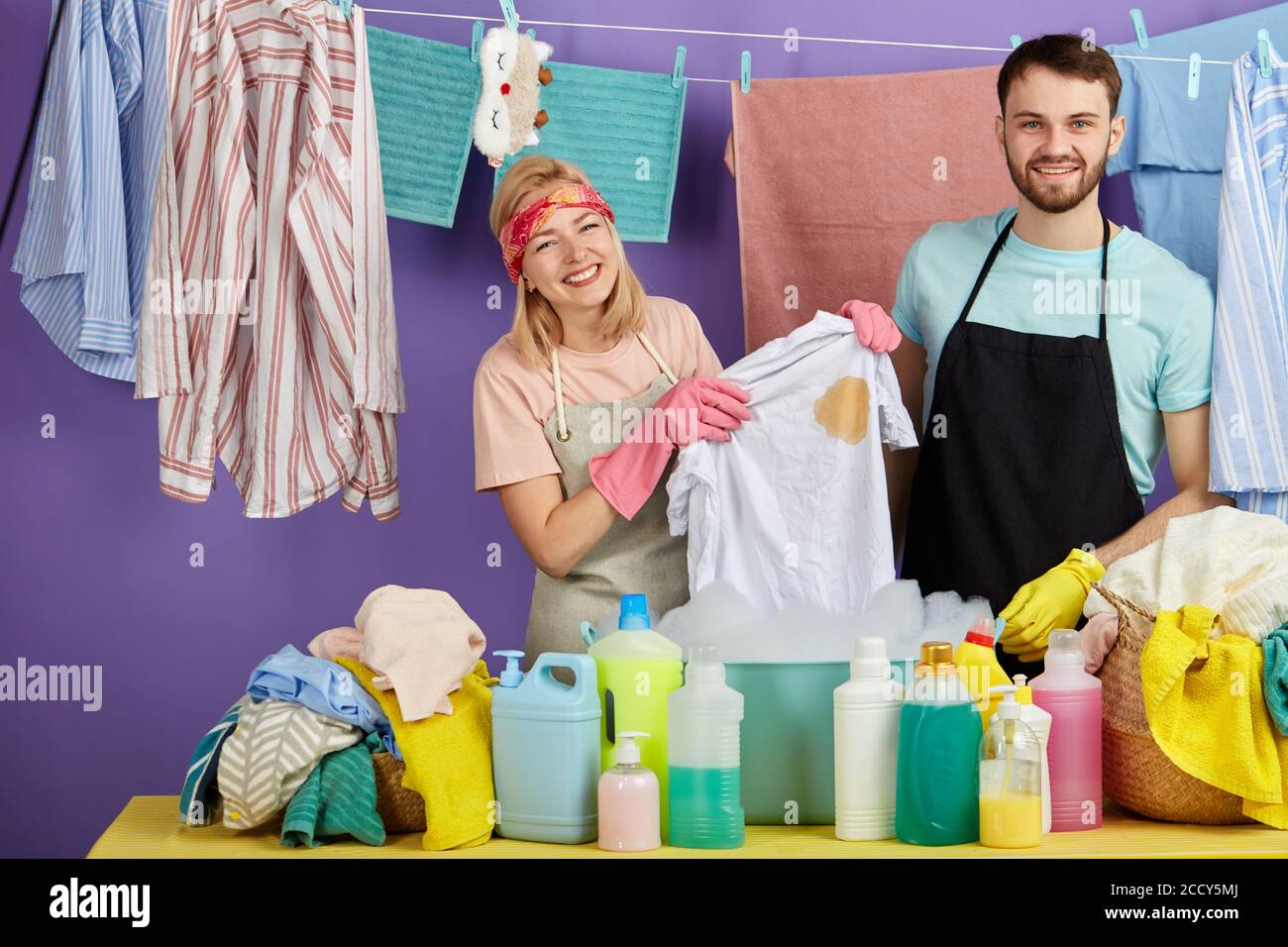Man washing clothes by hand hi-res stock photography and images - Alamy