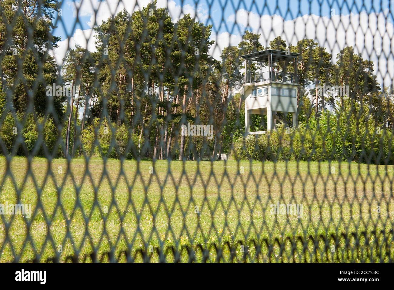 Original GDR border fence from the 1970s, view through GDR border fence ...
