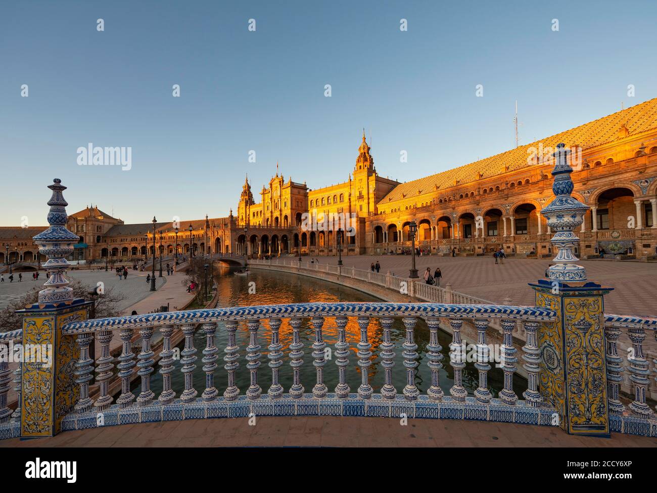 Bridge over canal, railing with painted azulejo tiles, Plaza de Espana ...