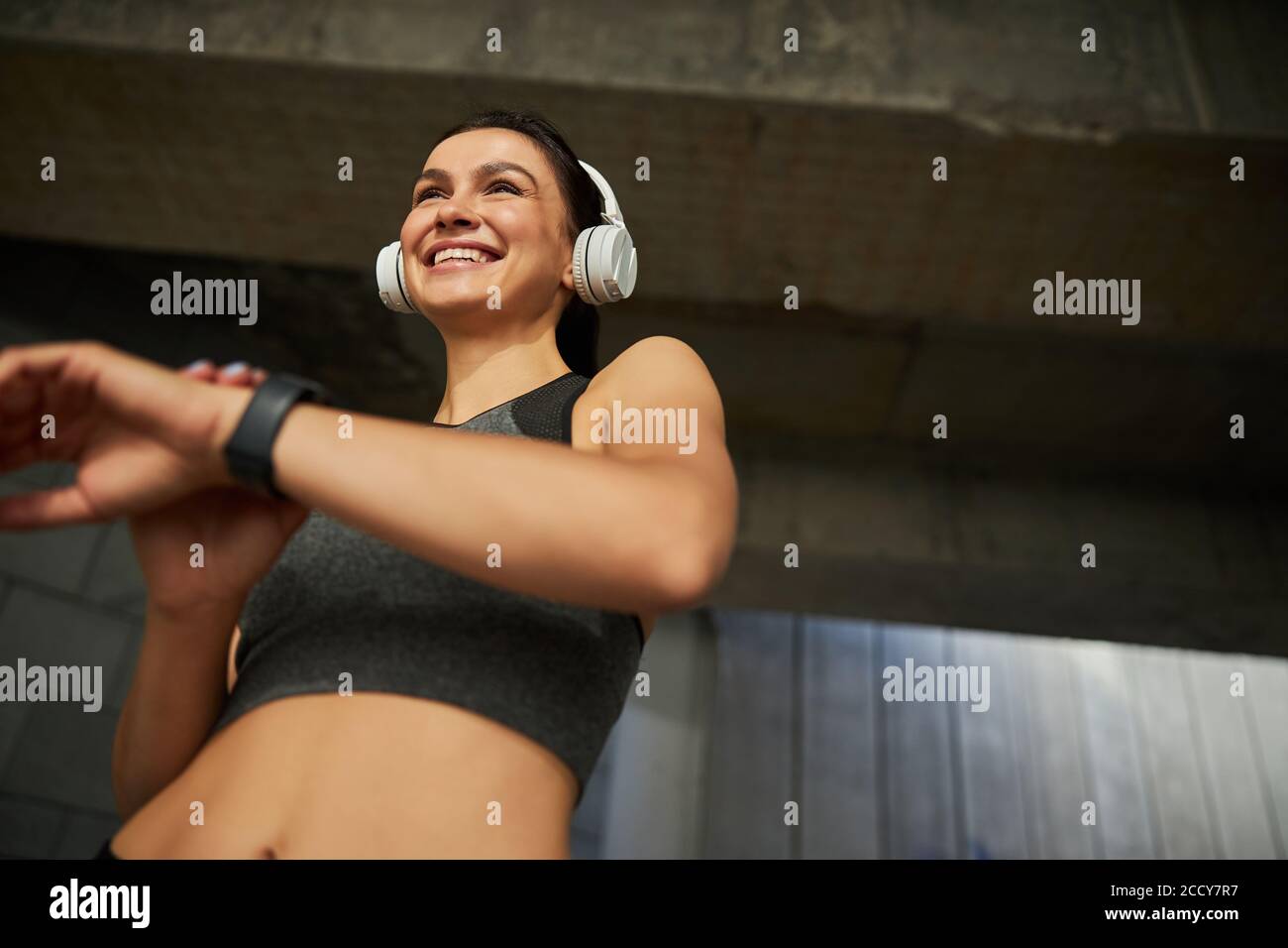 Focused photo on cute female demonstrating her smile Stock Photo - Alamy