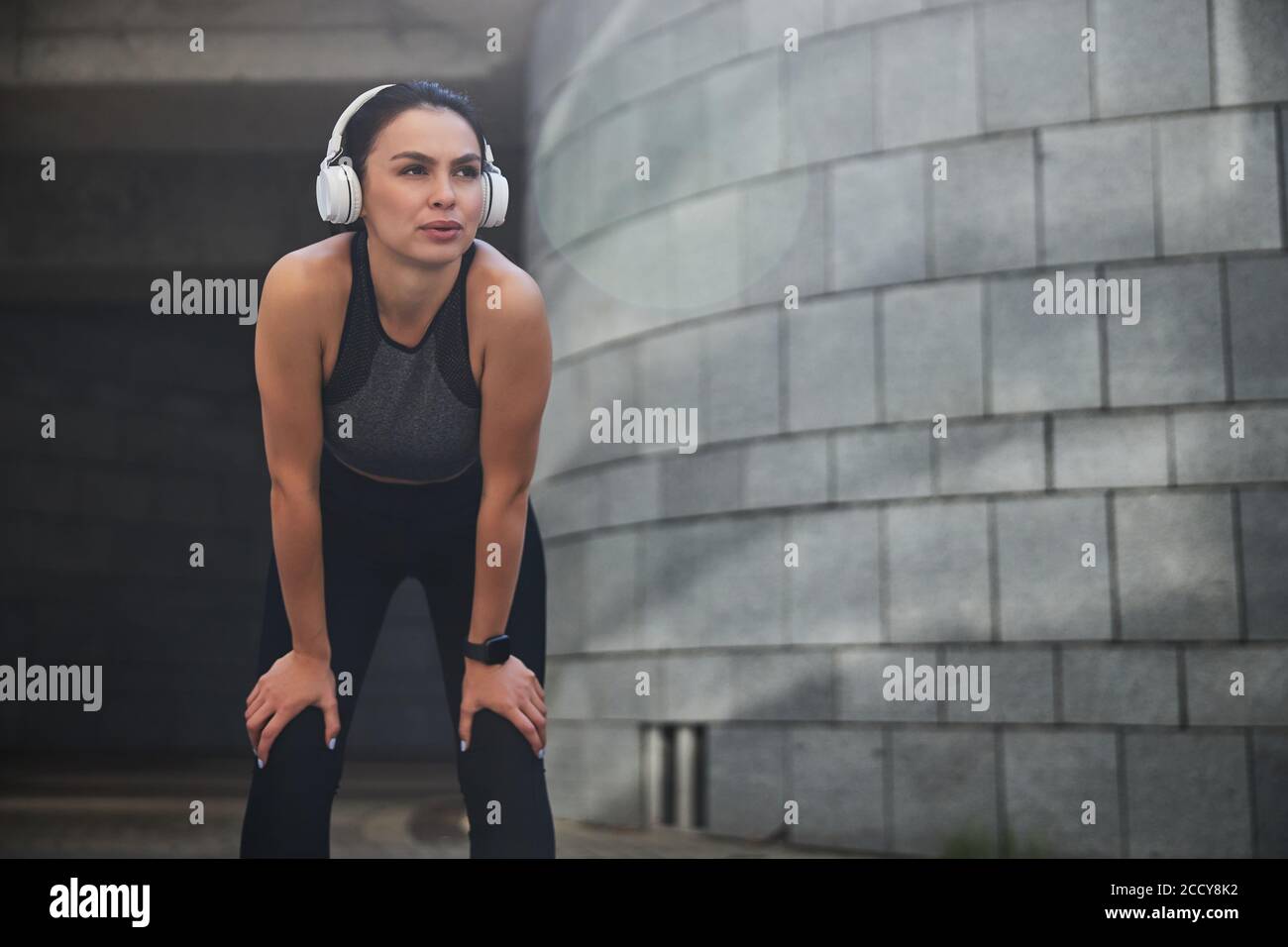 Young attractive female person restoring her breathing Stock Photo - Alamy