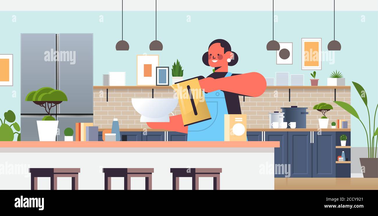 happy woman preparing food cooking at home concept modern kitchen ...
