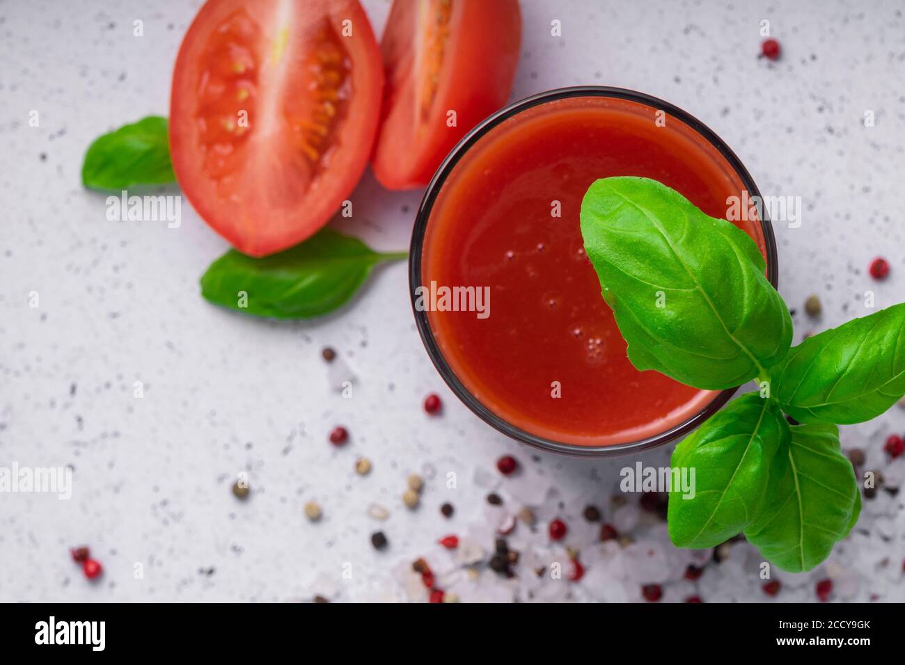 selective focus, natural tomato drink, tomato juice with spices and a ...