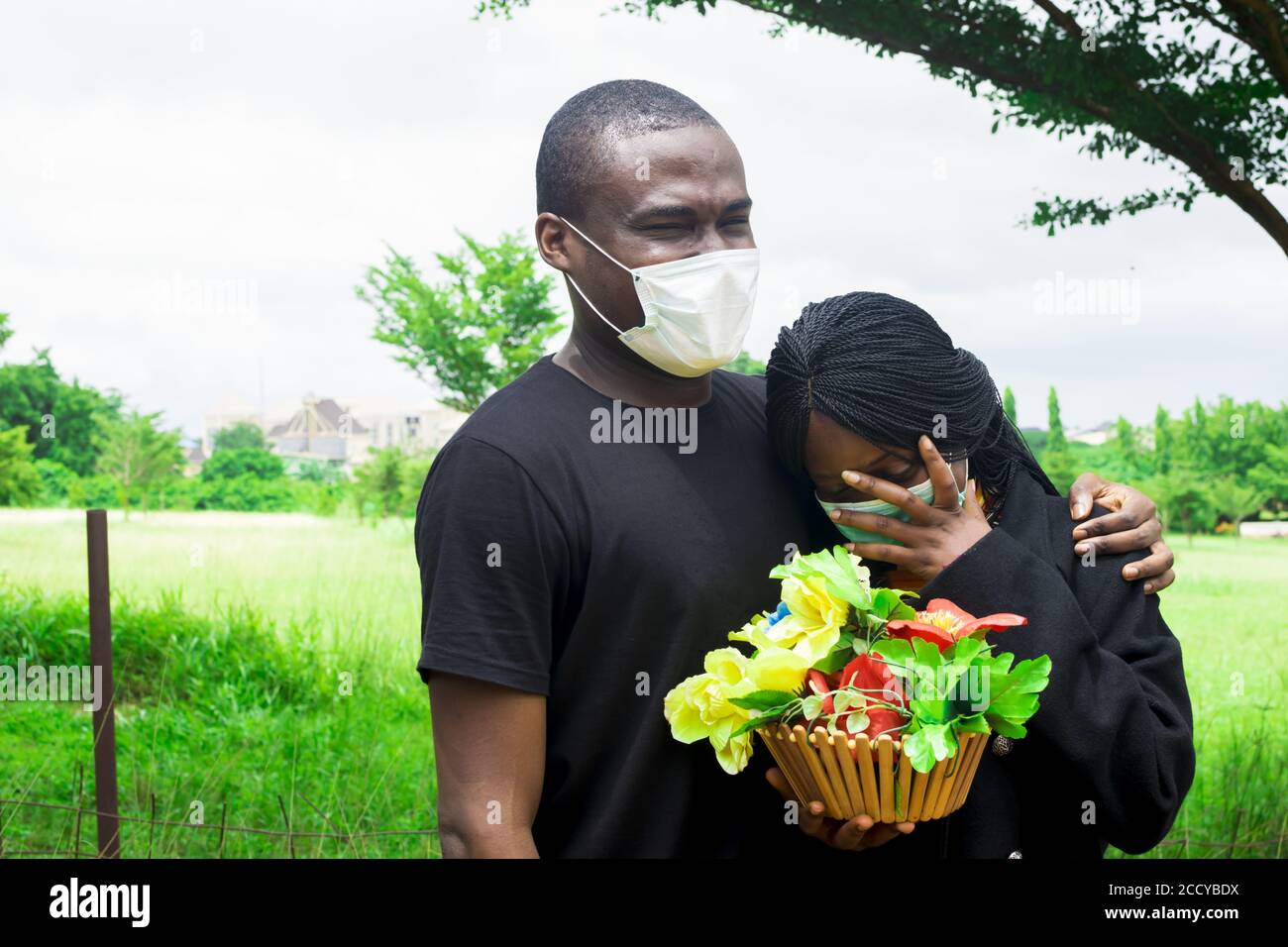 Closeup shot of Afro-American couple with medical masks - concept of ...