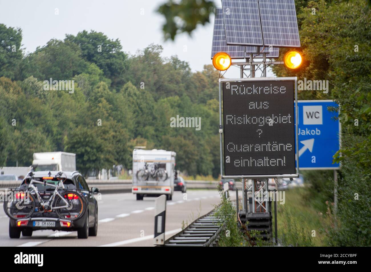 25 August 2020, Langenau: On the A7 motorway, travellers from risk ...