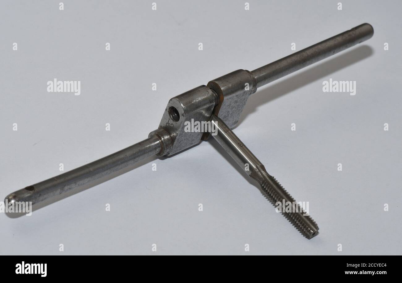 Mild steel tap wrench, hand made by an apprentice, holding a 1/4" BSF ...