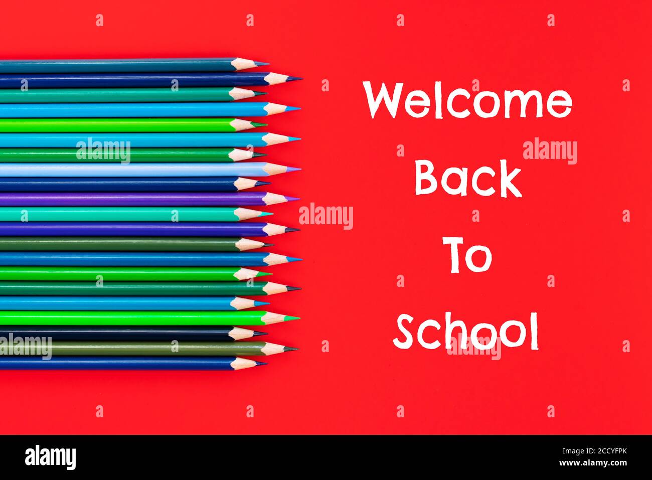 Welcome back to school background, colorful color pencil on red ...