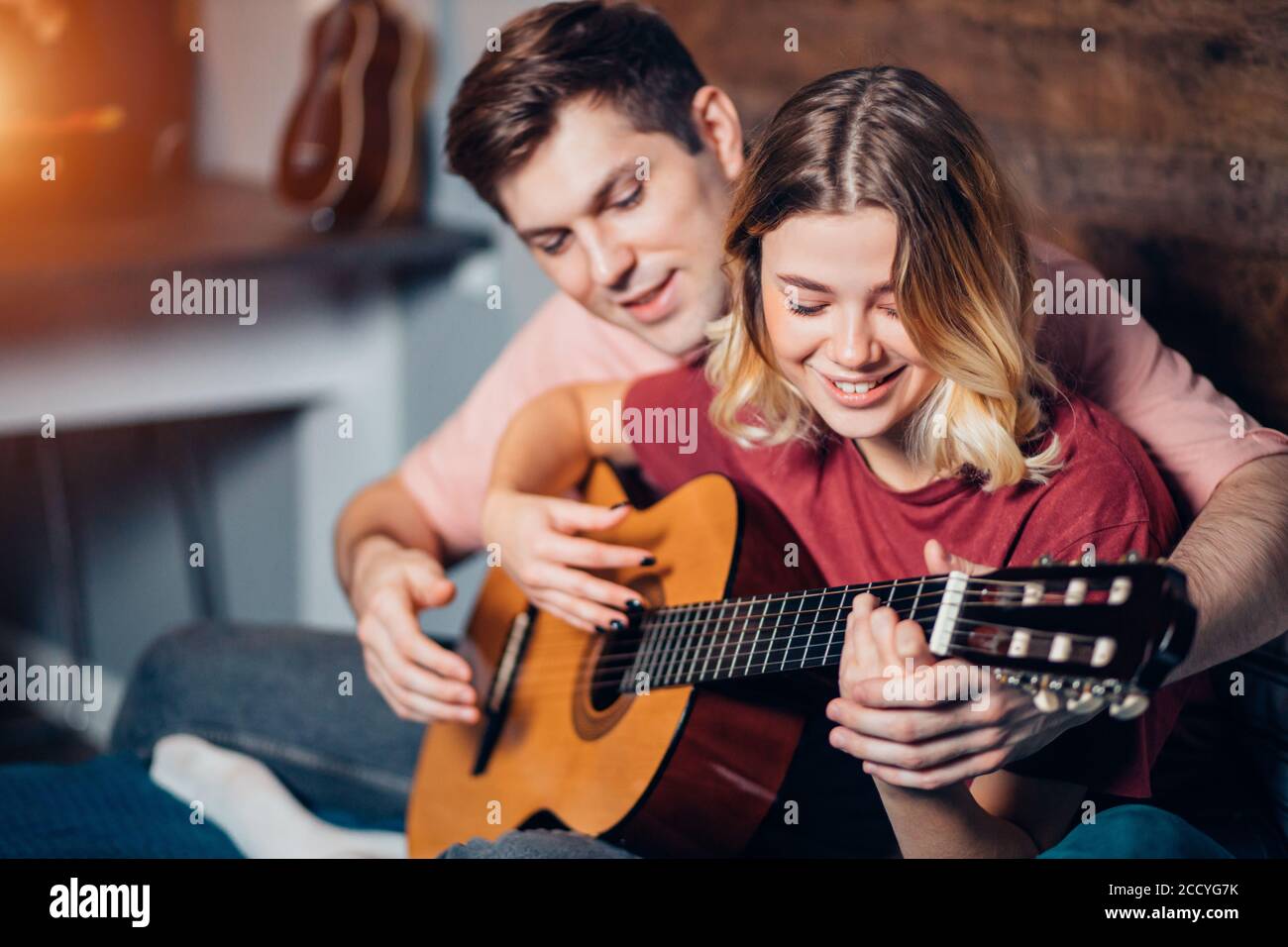Romantic Boy And Girl With Guitar