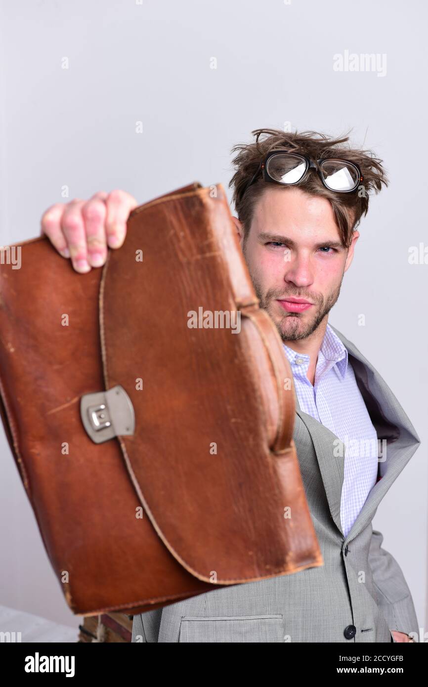 Man with briefcase isolated on white background. Serious man or ...