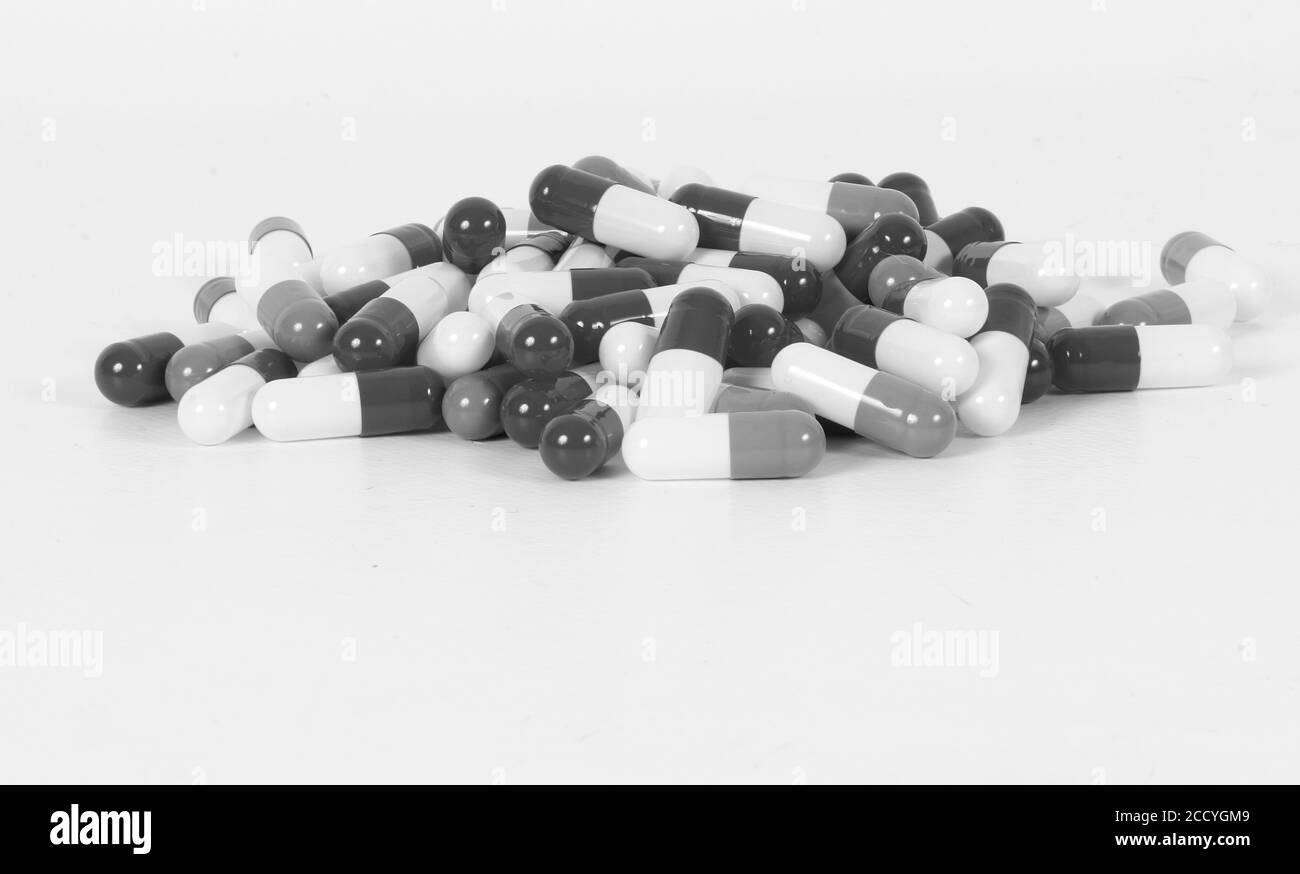Grayscale closeup shot of medicine capsules Stock Photo - Alamy