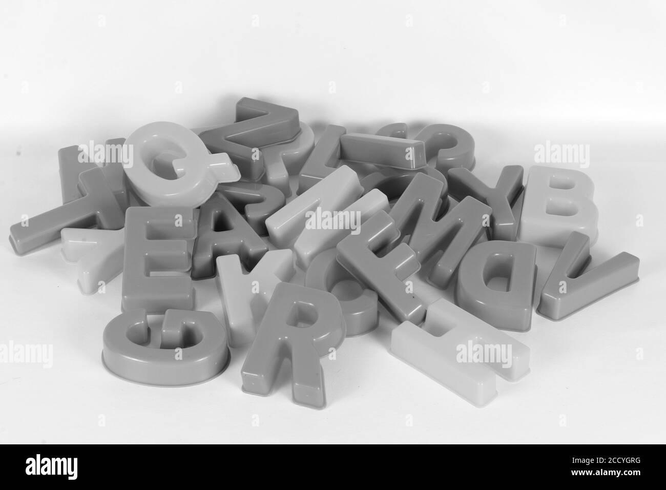 Grayscale closeup shot of different letter figures Stock Photo - Alamy