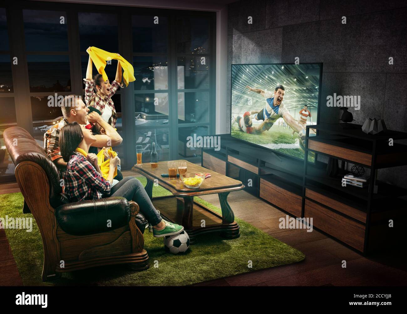 Group of friends watching rugby match, sport together. Emotional men ...