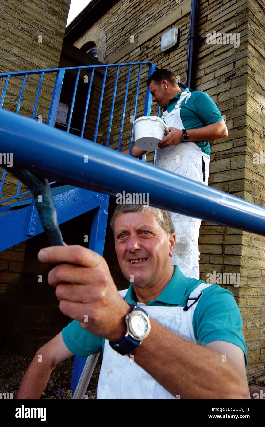 Painters & decorators painting old NHS building Yorkshire UK Stock ...