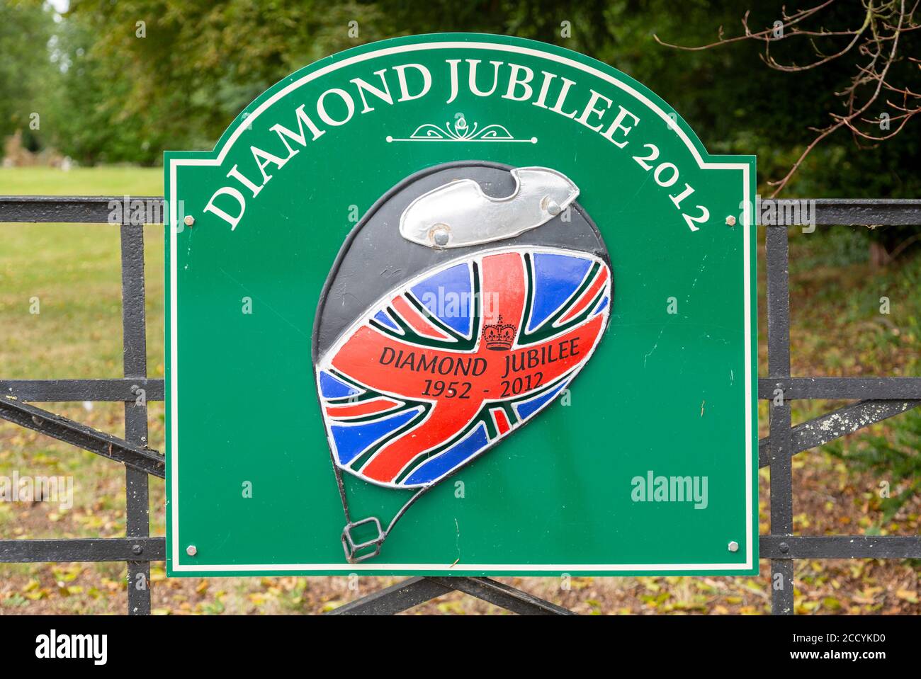 Sign for Diamond Jubilee 1952-2012 on gate entrance to public park ...