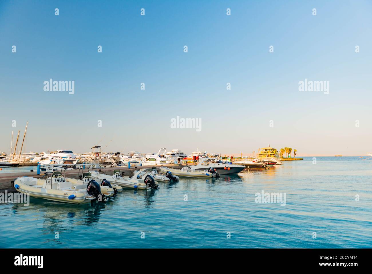 Egypt, Hurghada Marina bay harbor with parked yachts and sails boats at ...