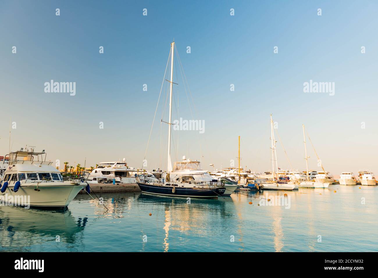 Egypt, Hurghada Marina bay harbor with parked yachts and sails boats at ...