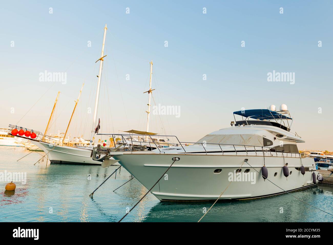 Egypt, Hurghada Marina bay harbor with parked yachts and sails boats at ...
