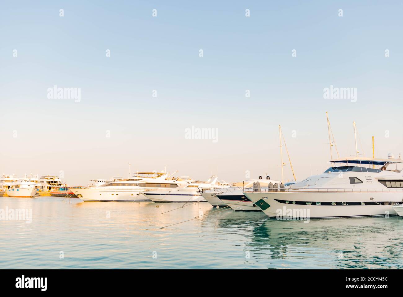 Egypt, Hurghada Marina bay harbor with parked yachts and sails boats at ...