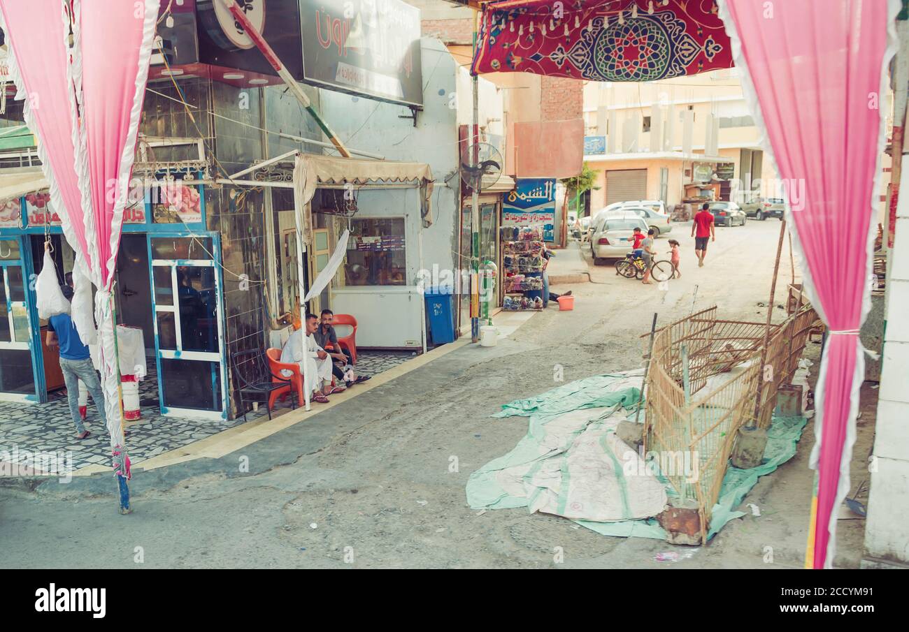 Egypt, Hurghada. egyptian everyday street life at sidewalk buildings ...