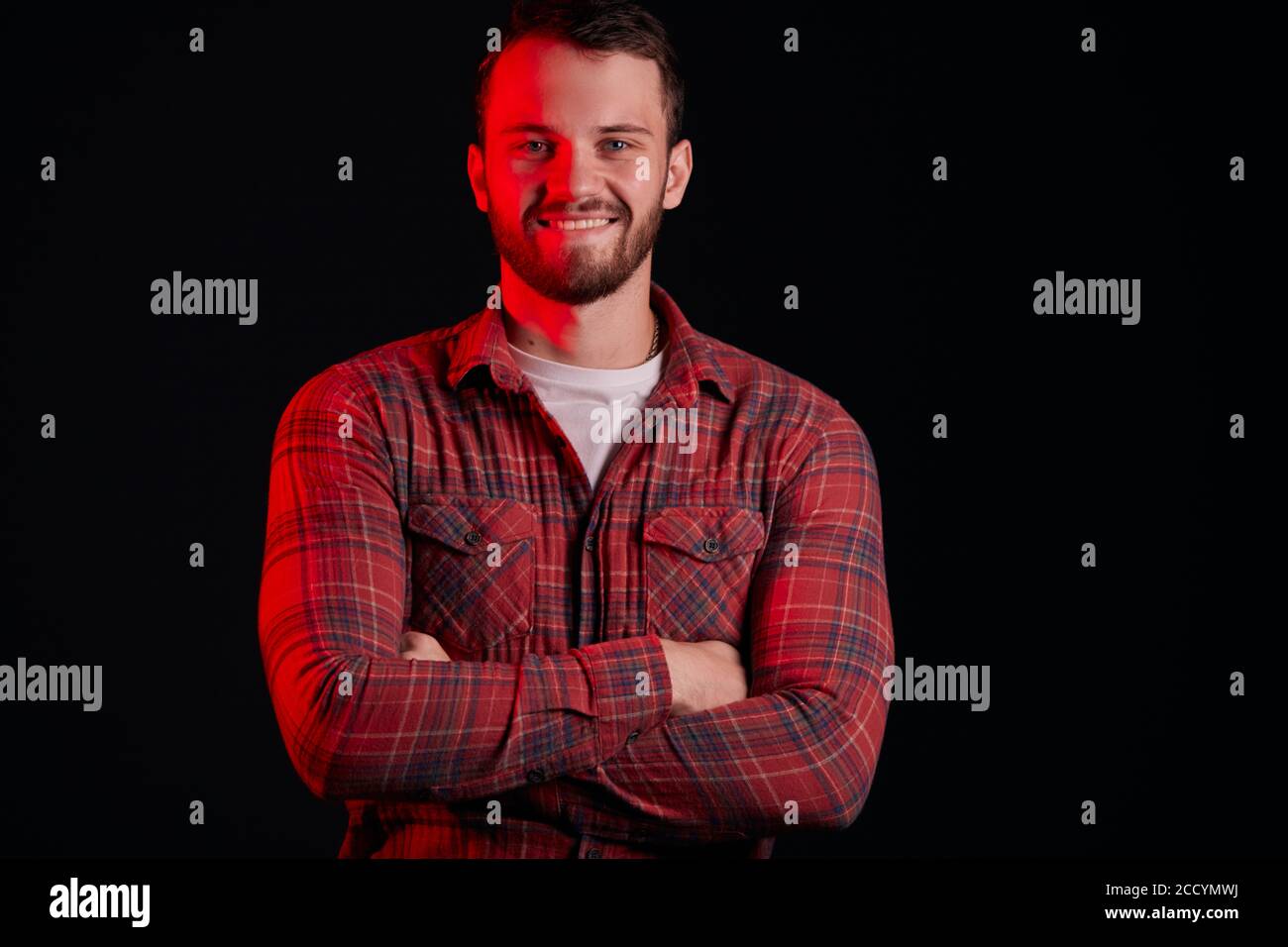 Handsome smiling guy of caucasian appearance stand open-mindly smiling ...