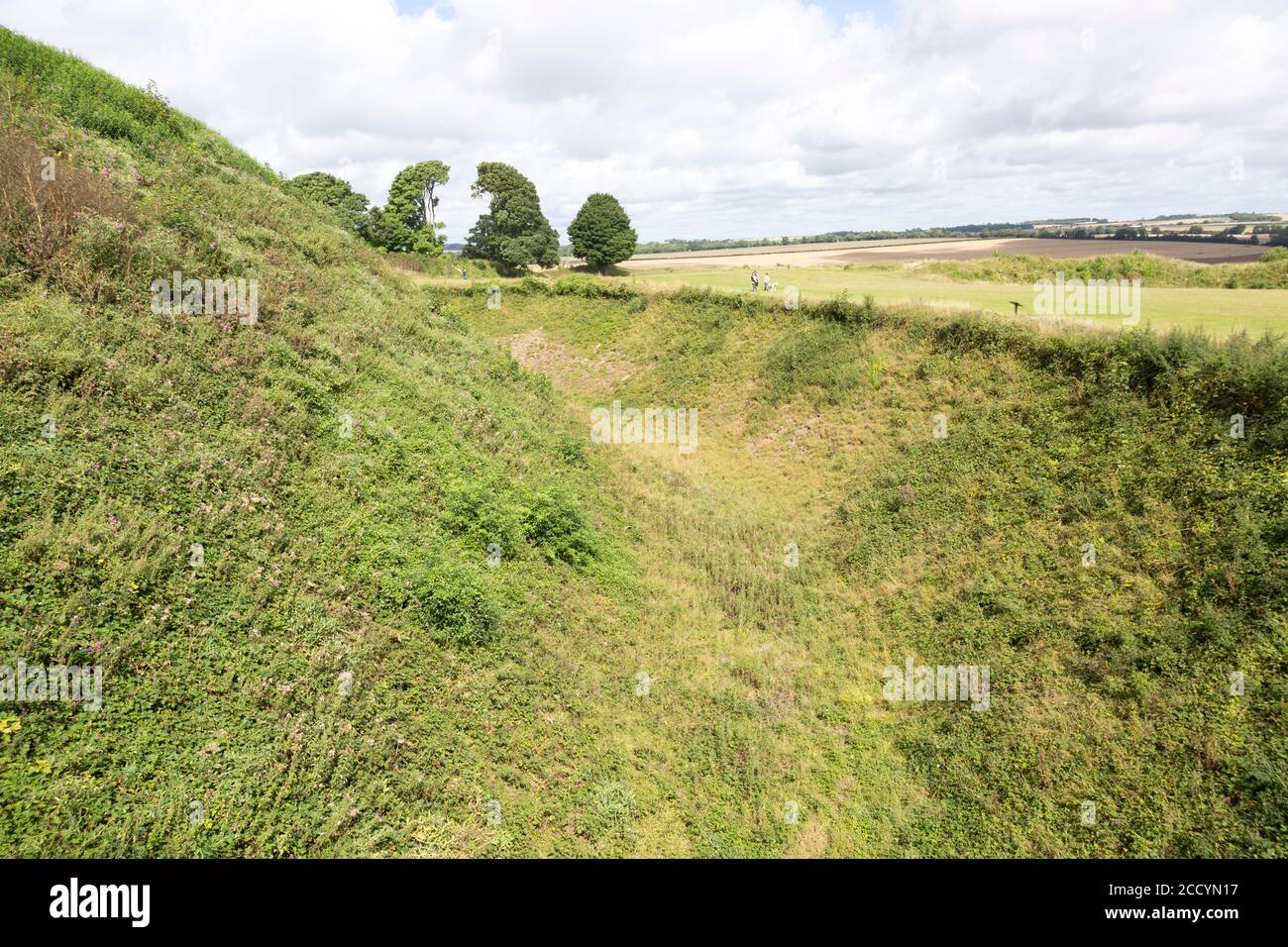 Deep defensive ditch and rampart at Old Sarum castle, Salisbury ...