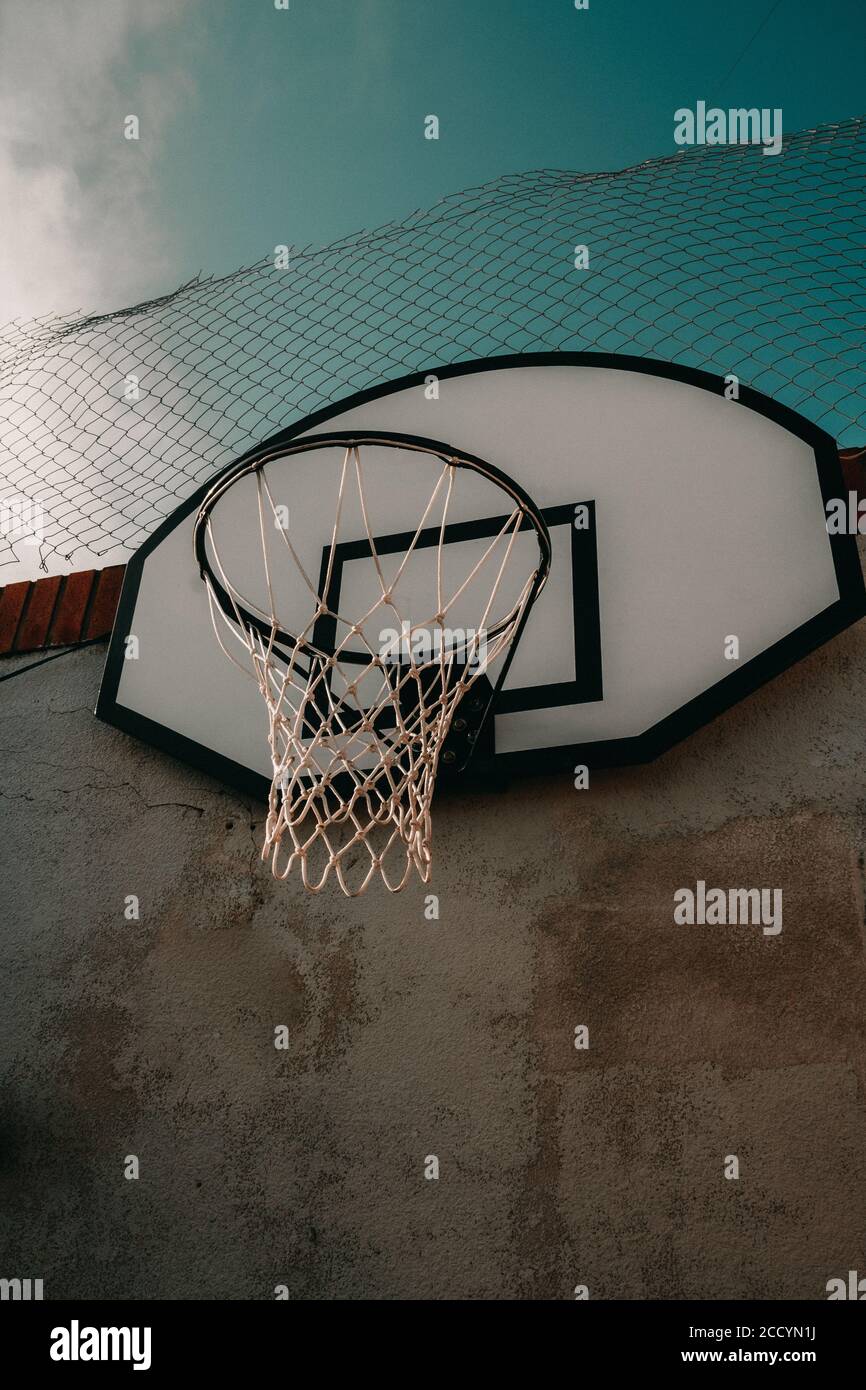 Vertical low angle shot of basketball hoop Stock Photo - Alamy
