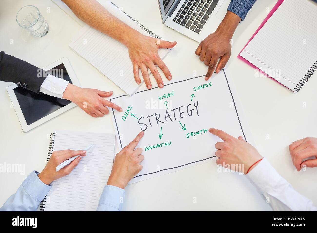 Hands of business people discussing strategy plan in brainstorming ...