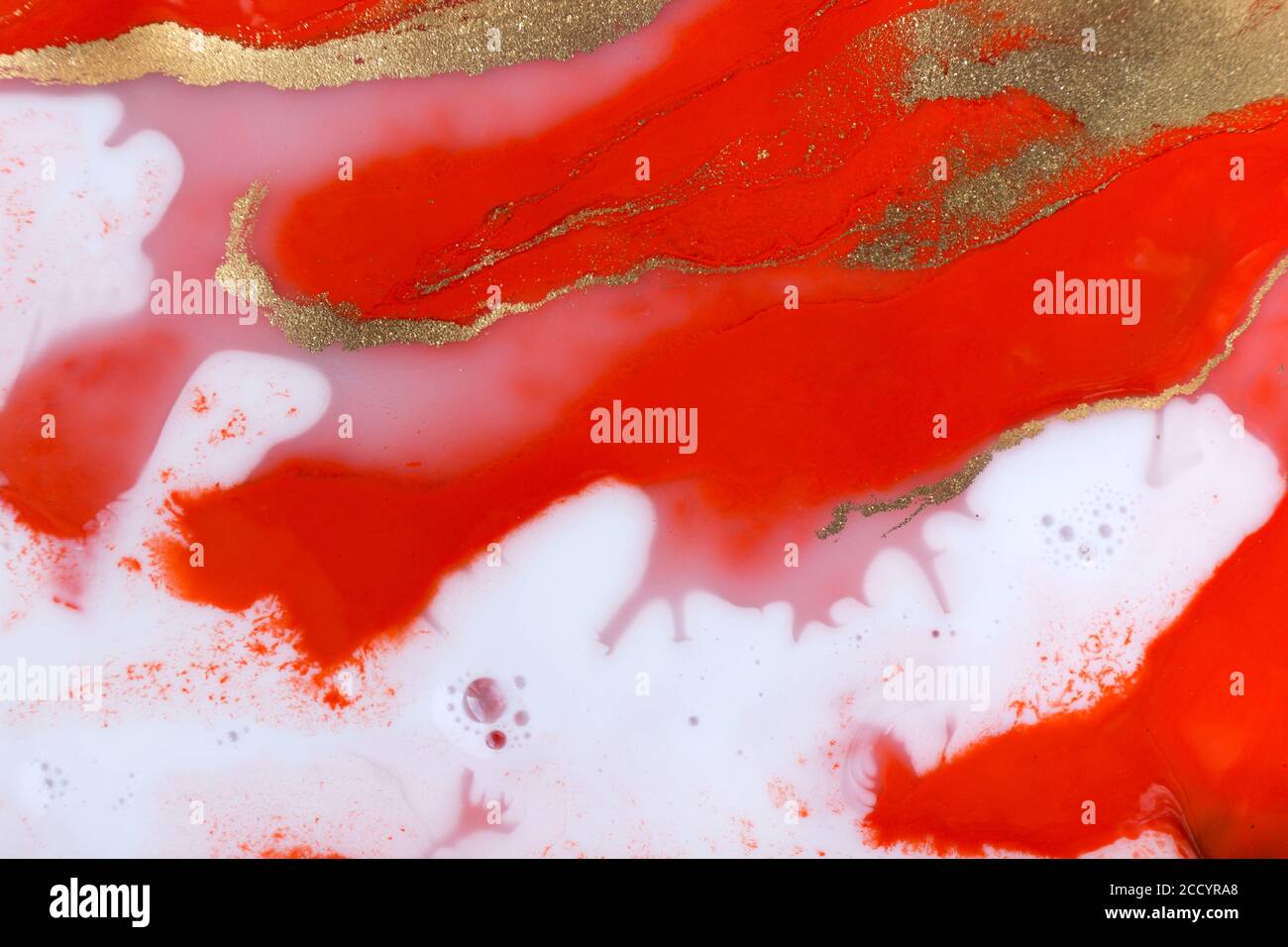 Red, white and gold paint liquid background. Abstract rich texture ...