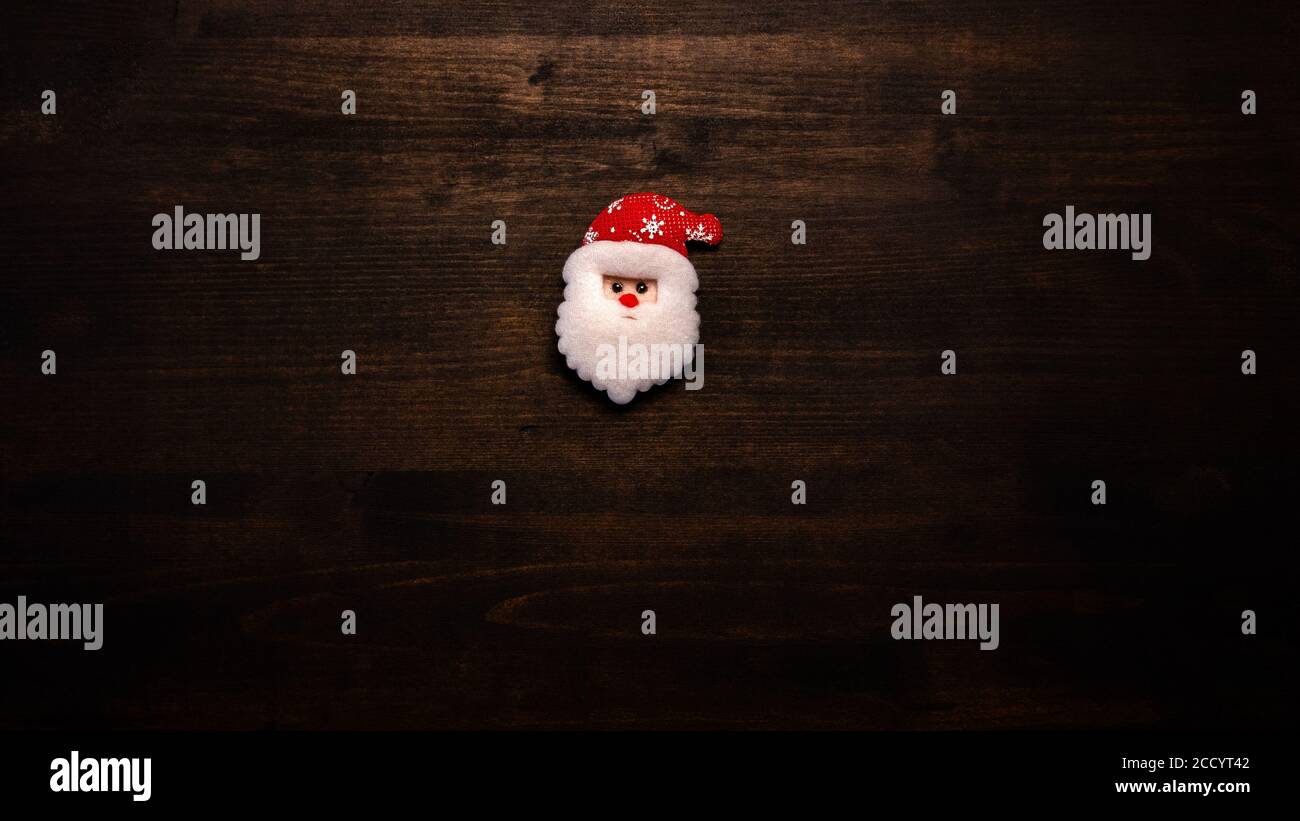 Santa Claus flat lay top view on dark wooden table Stock Photo - Alamy