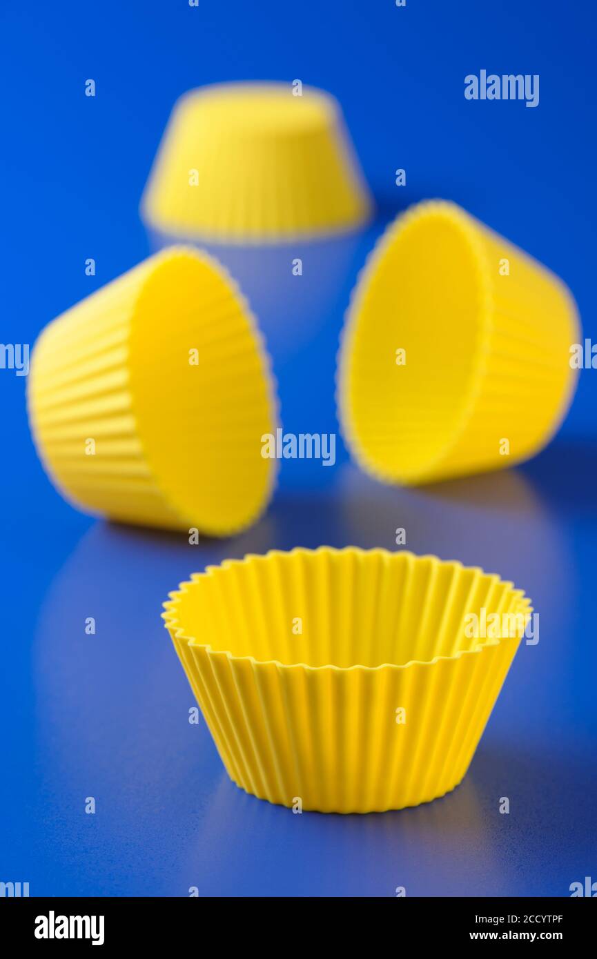 Bright colored silicone baking cupcakes and muffins Stock Photo - Alamy