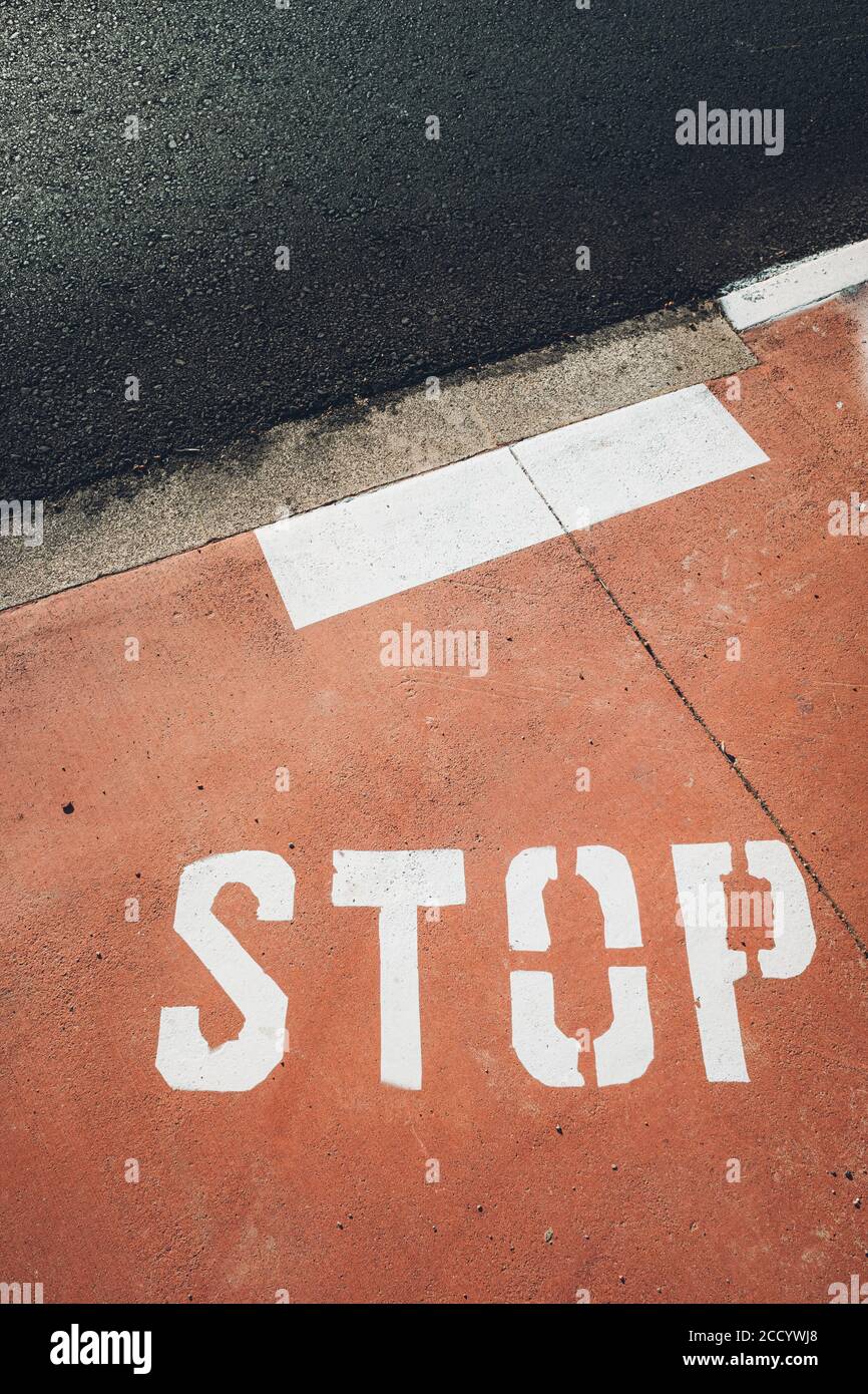 White and red stop floor road sign hi-res stock photography and images ...