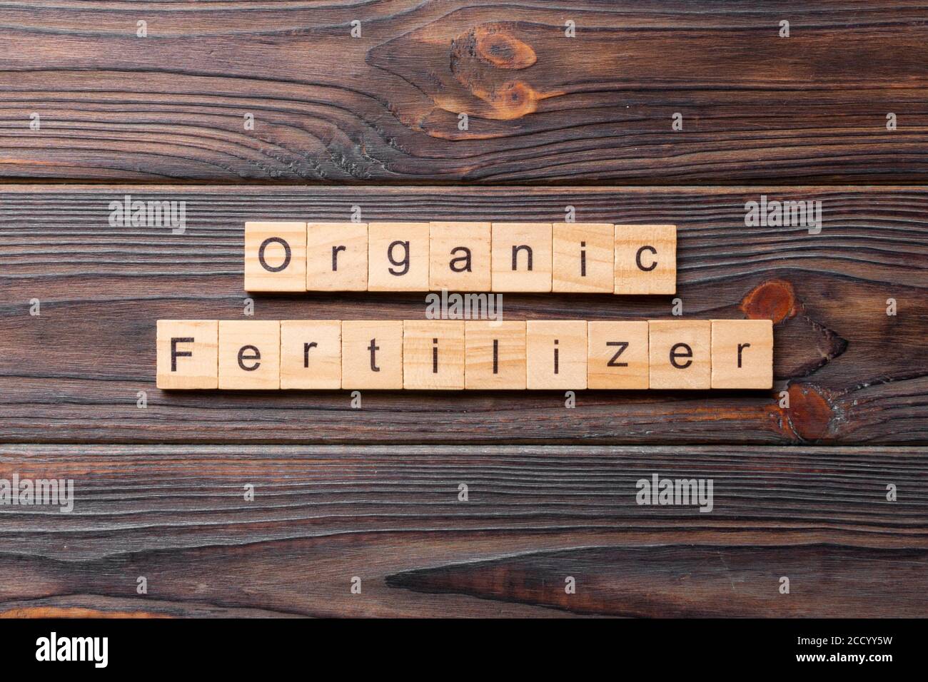 organic fertilizer word written on wood block. organic fertilizer text ...