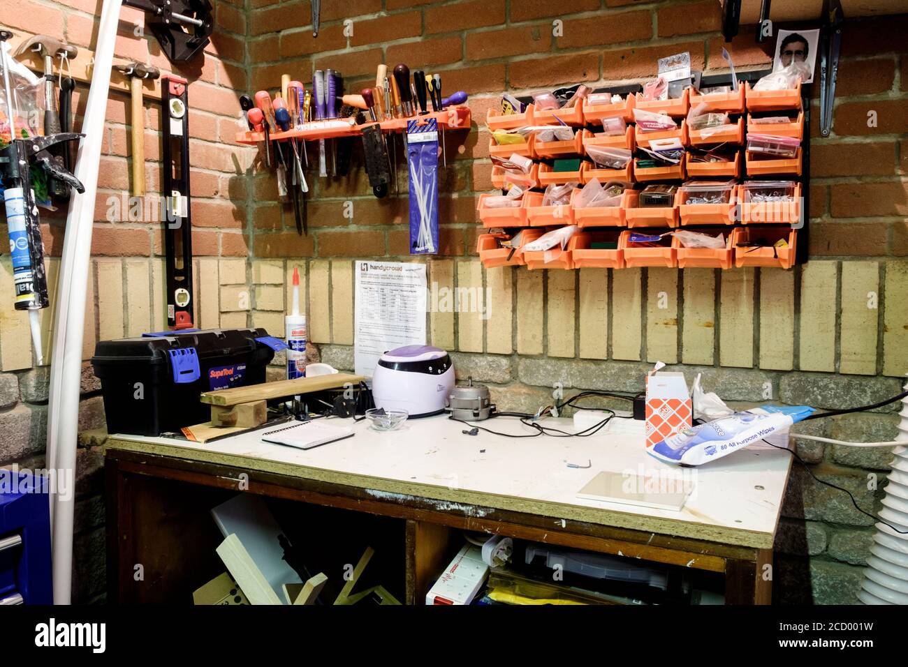 A small home workshop located at the back of a garage Stock Photo - Alamy