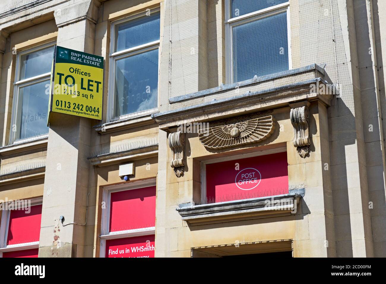 Post Office building with to let sign Stock Photo - Alamy