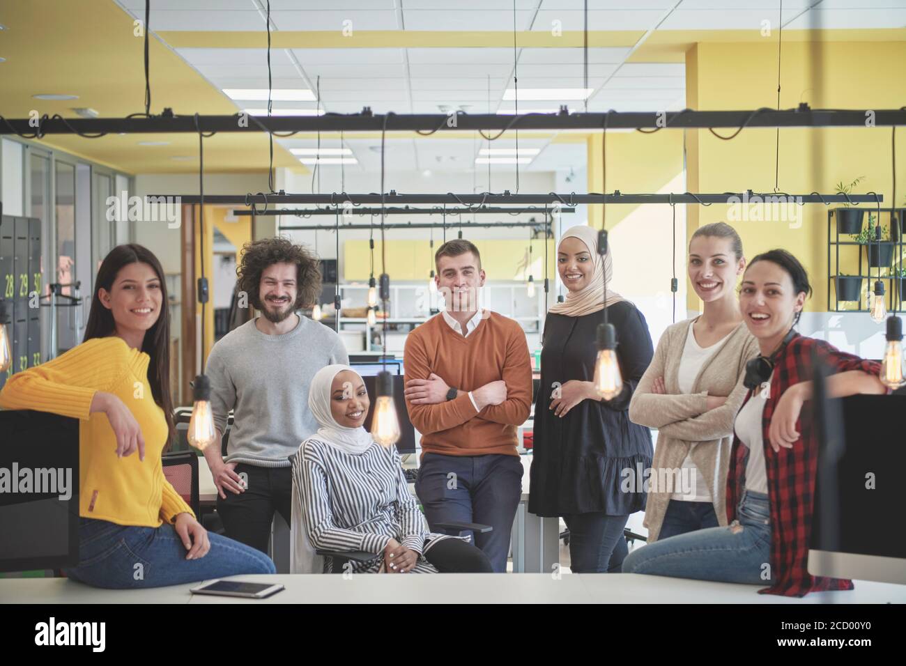 Business team portrait at modern startup office, standing together and ...