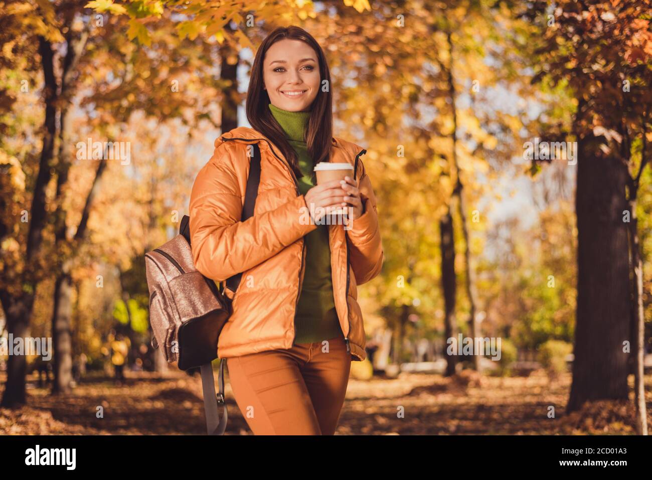 Photo of charming cute lady smiling hold cup drink coffee enjoy morning ...