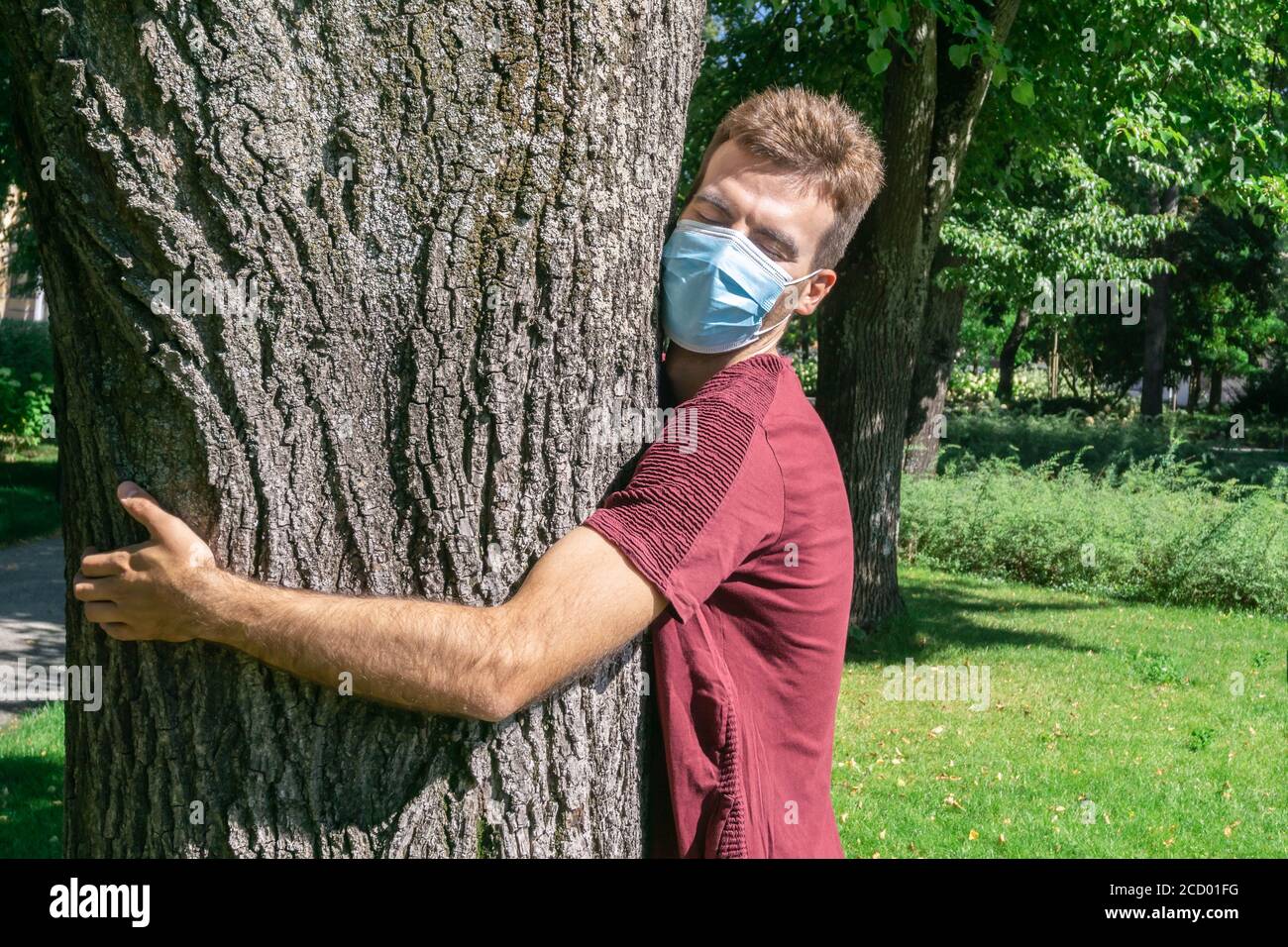 Protective embrace hi-res stock photography and images - Alamy