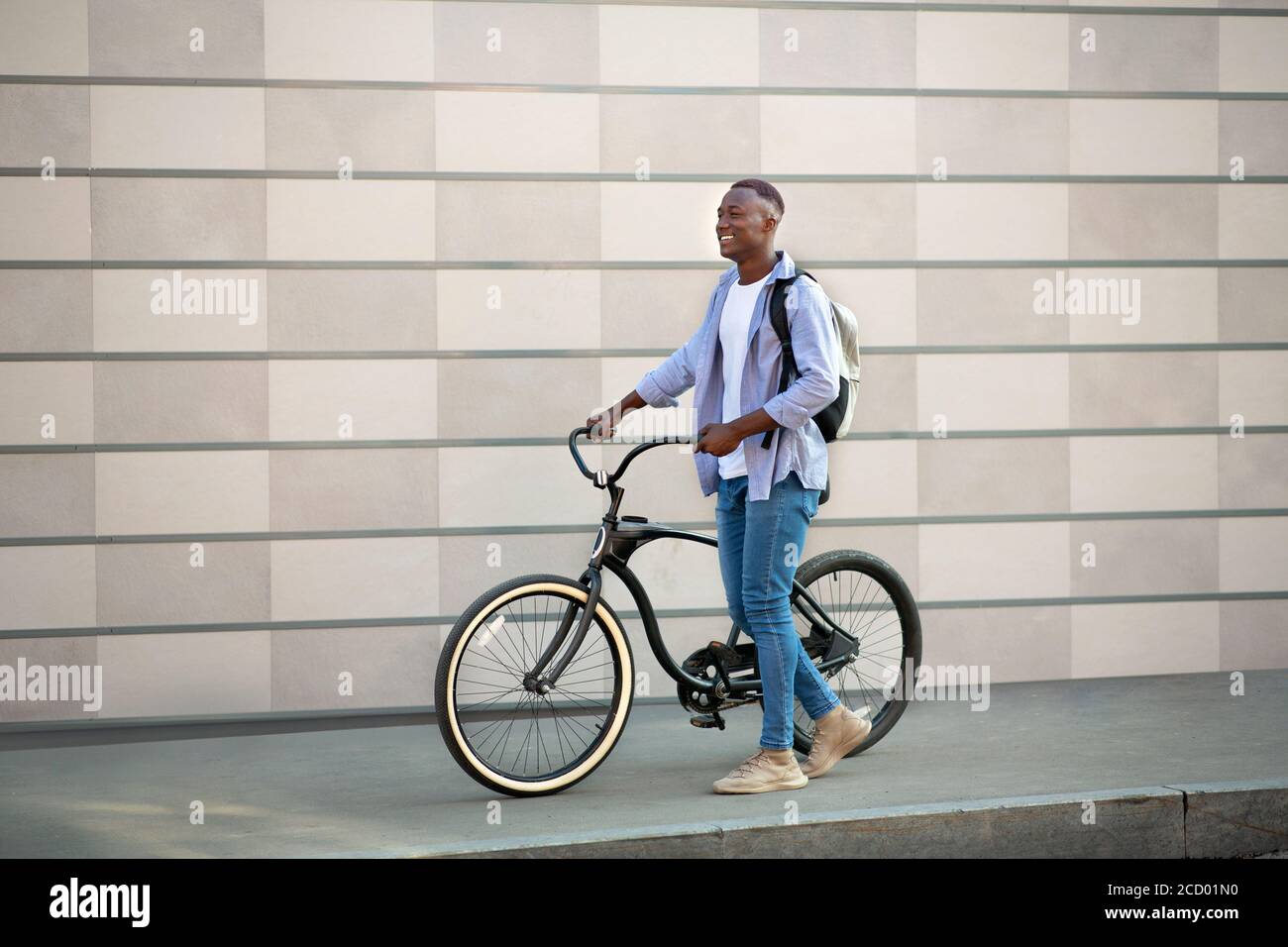 Man backpack african hi-res stock photography and images - Alamy