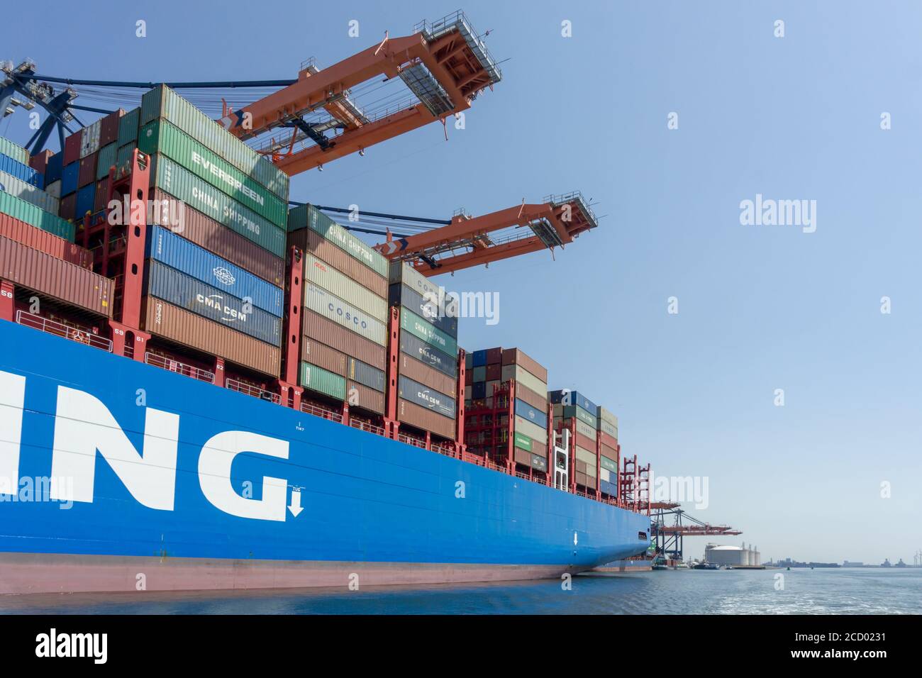 Cosco shipping container ship loading and unloading hi-res stock ...
