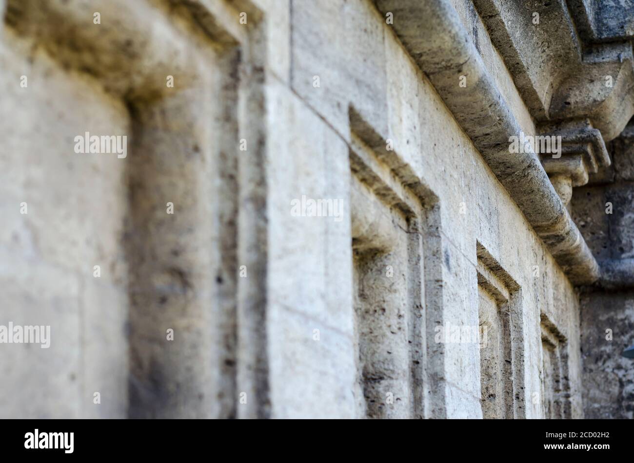 Fragment of the facade of an old building made of shell rock. Exterior ...