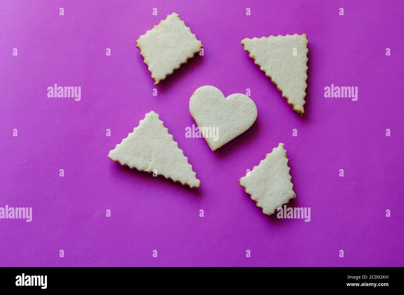 Creative background Homemade shortbread cookies. Heart symbol ...