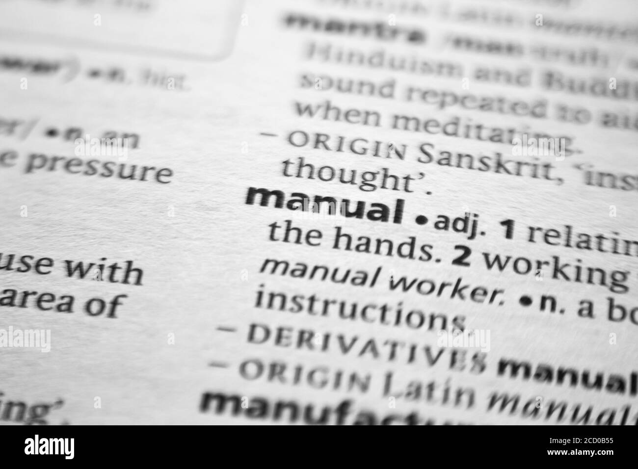 Word or phrase Manual in a dictionary Stock Photo - Alamy