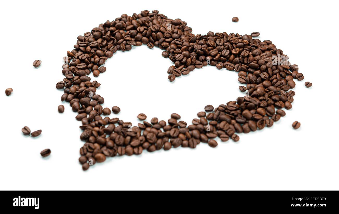 Heart made of coffee beans on a white background Stock Photo - Alamy